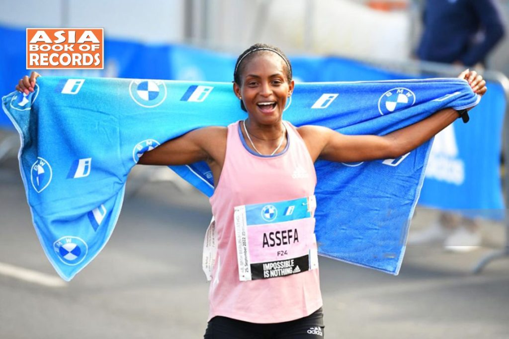 Fastest female person to run the Berlin marathon - Asia Book of Records