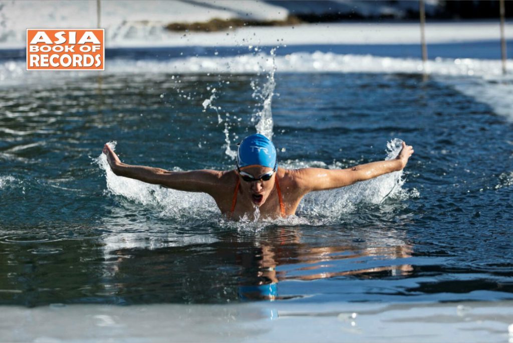 Fastest female to do 100 m butterfly ice swim - Asia Book of Records