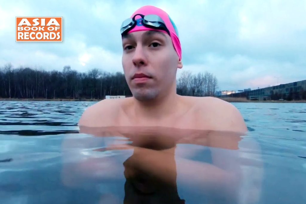 Fastest person to do 1 km ice swim - Asia Book of Records
