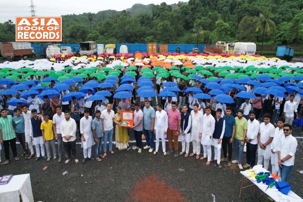 Largest human Jain Flag formation - Asia Book of Records
