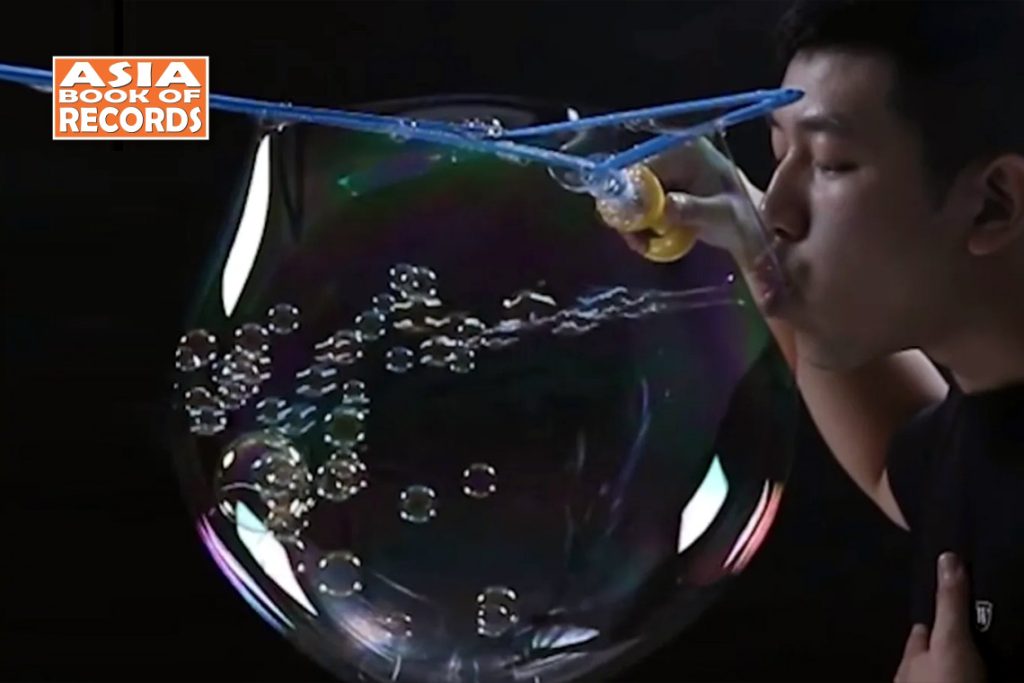 Longest hanging bubble chain inside a soap bubble dome - Asia Book of Records