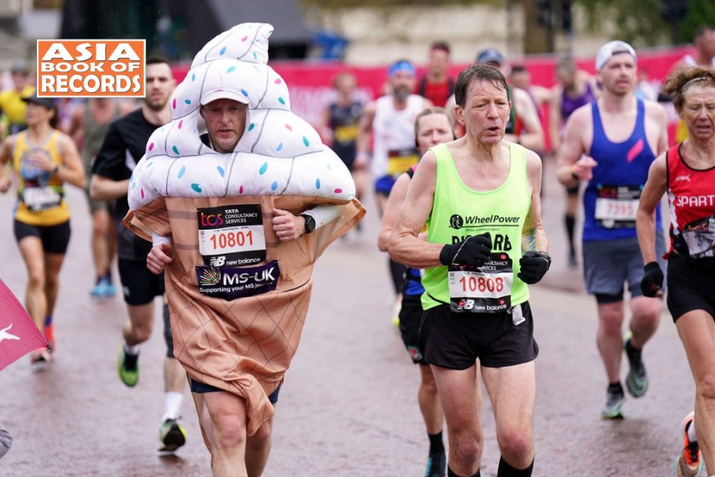 Fastest marathon runner dressed as a sweet food - Asia Book of Records