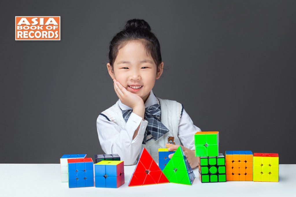 Youngest kid to solve a Pyraminx puzzle blindfolded – Asia Book of Records Youngest kid to solve a Pyraminx puzzle blindfolded – Asia Book of Records