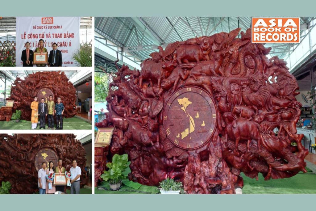 Unique double-sided sculpture carved from a single apitong tree stump ...